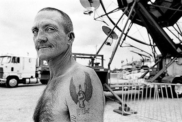 Carnival Worker – Between Two Rocks